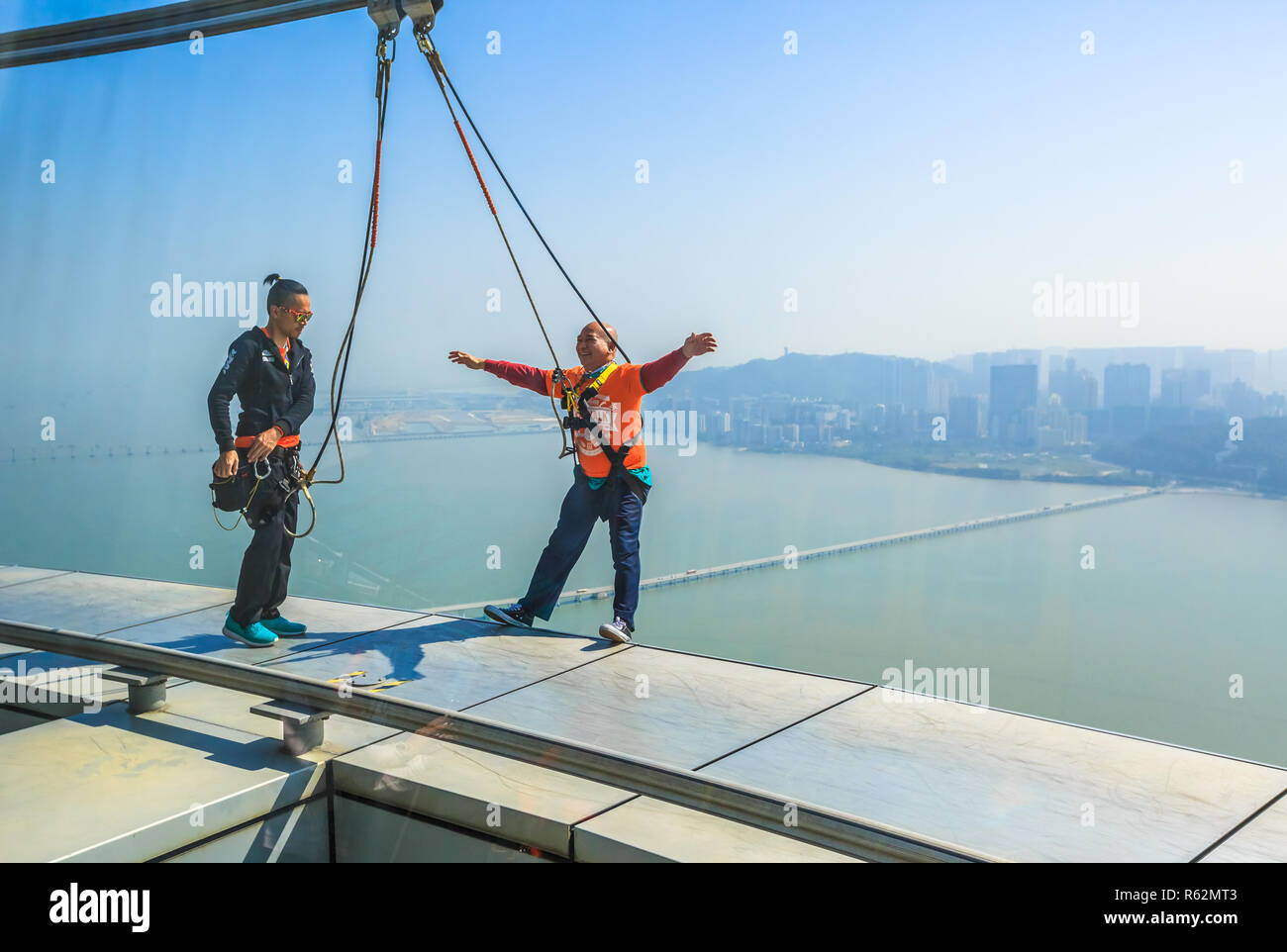 Macau, China - December 9, 2016: A boy and his trainer during the ...