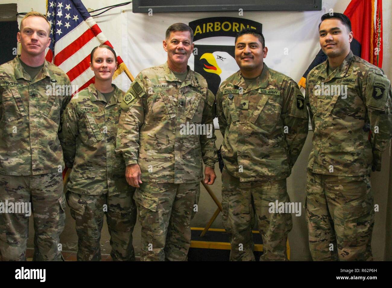 Major General Flem Walker Jr. (center), the commanding general for the ...