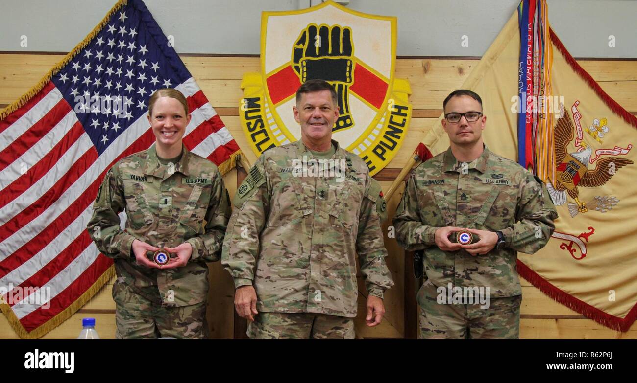 Major General Flem Walker Jr. (center), the commanding general for the ...