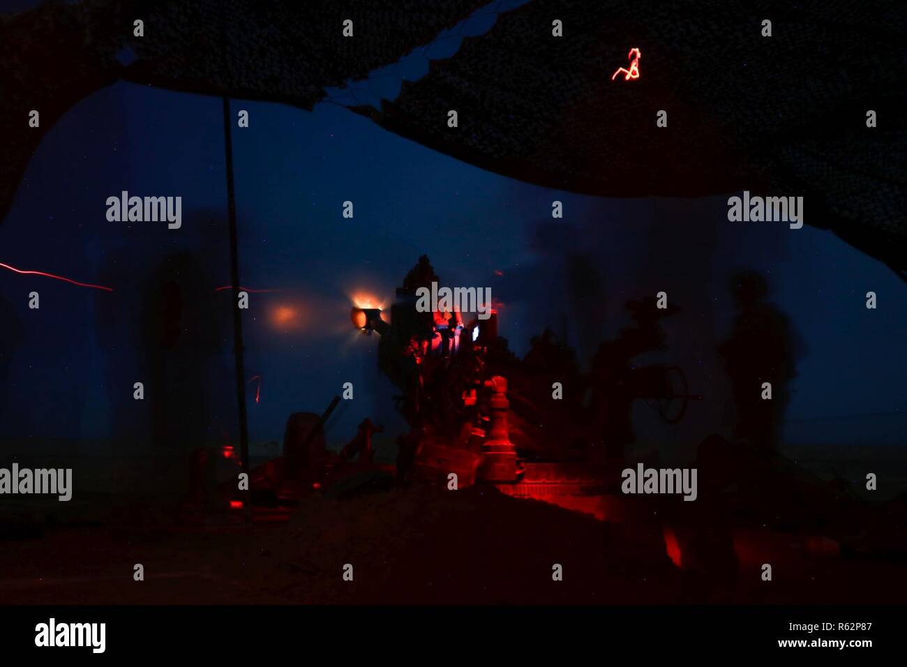 3rd Cavalry Regiment Field Artillery Squadron Troopers fire an M777A2 ...