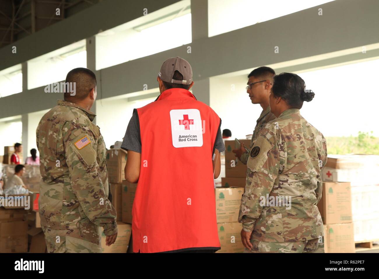 An American Red Cross personnel talks with U.S. Army Reserve Soldiers ...