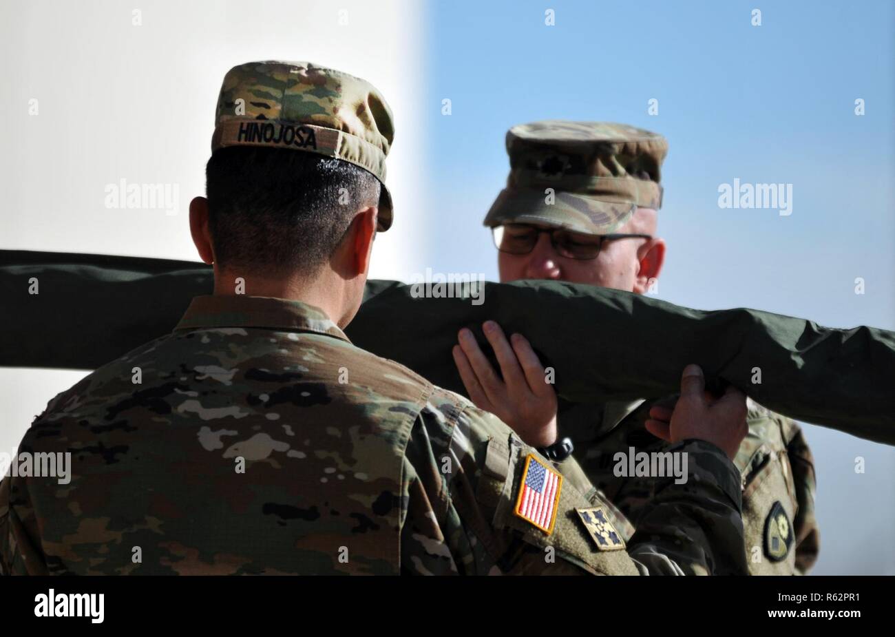 Command Sgt. Maj. Abraham Hinojosa, left, command sergeant major of the ...