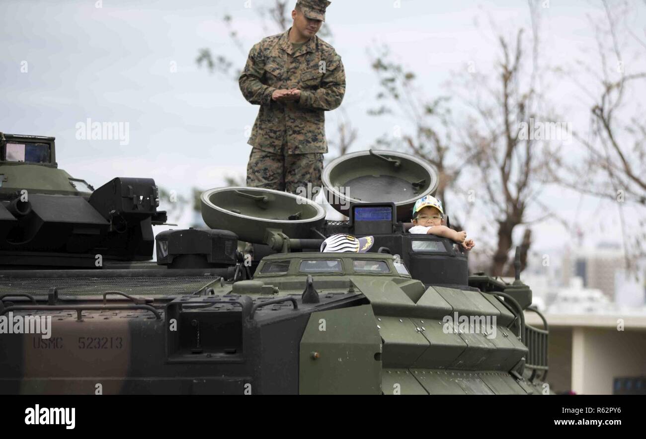 Marines from 3rd Marine Division run a static display of an amphibious ...