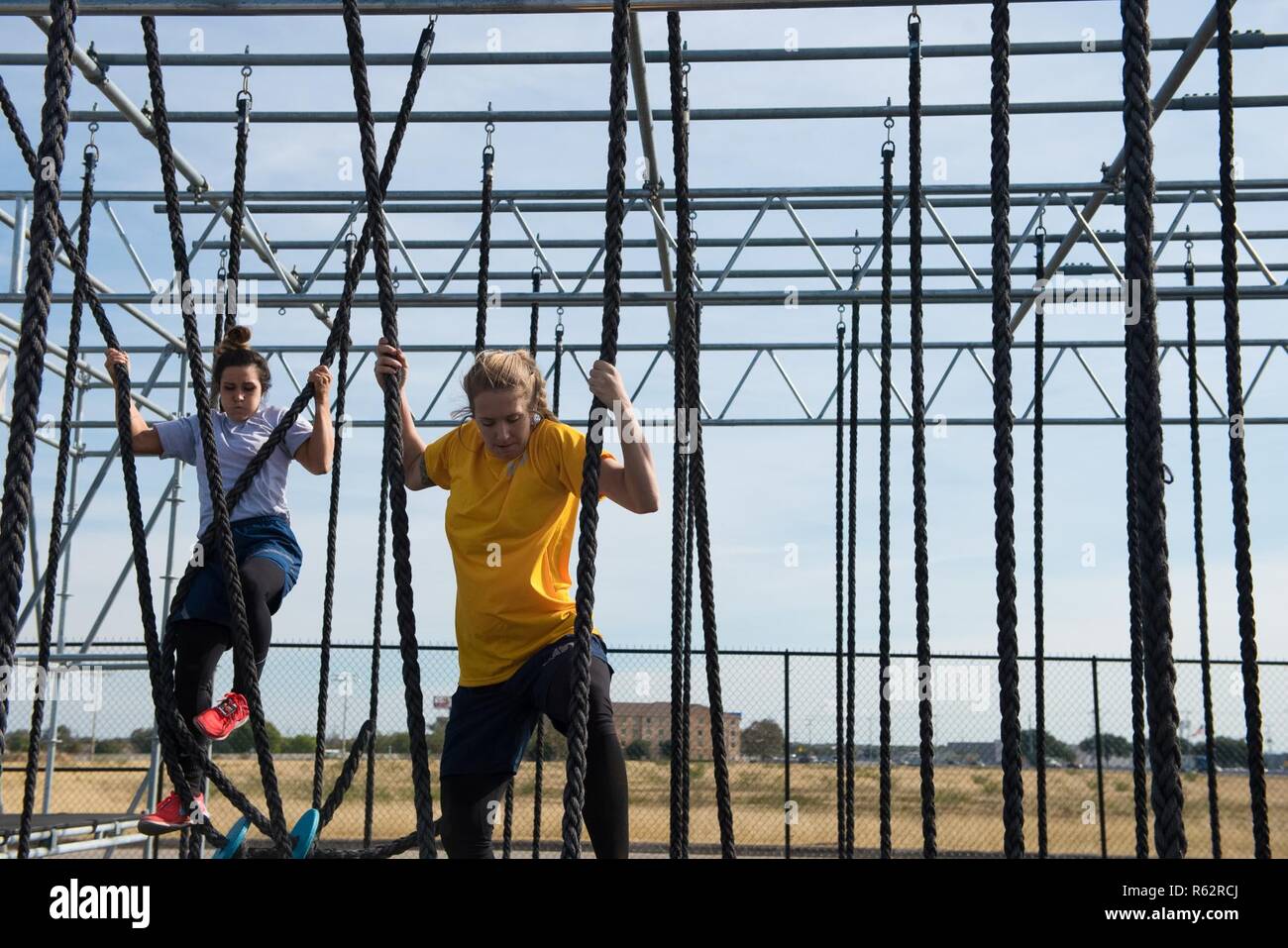 Alpha Warrior athletes compete on an obstacle race during the Alpha ...