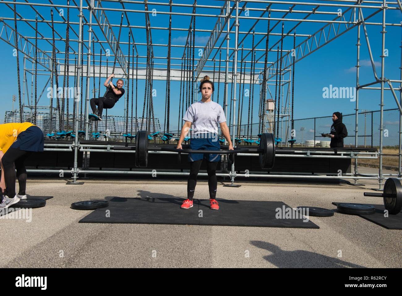 Alpha Warrior athletes compete on an obstacle race during the Alpha ...