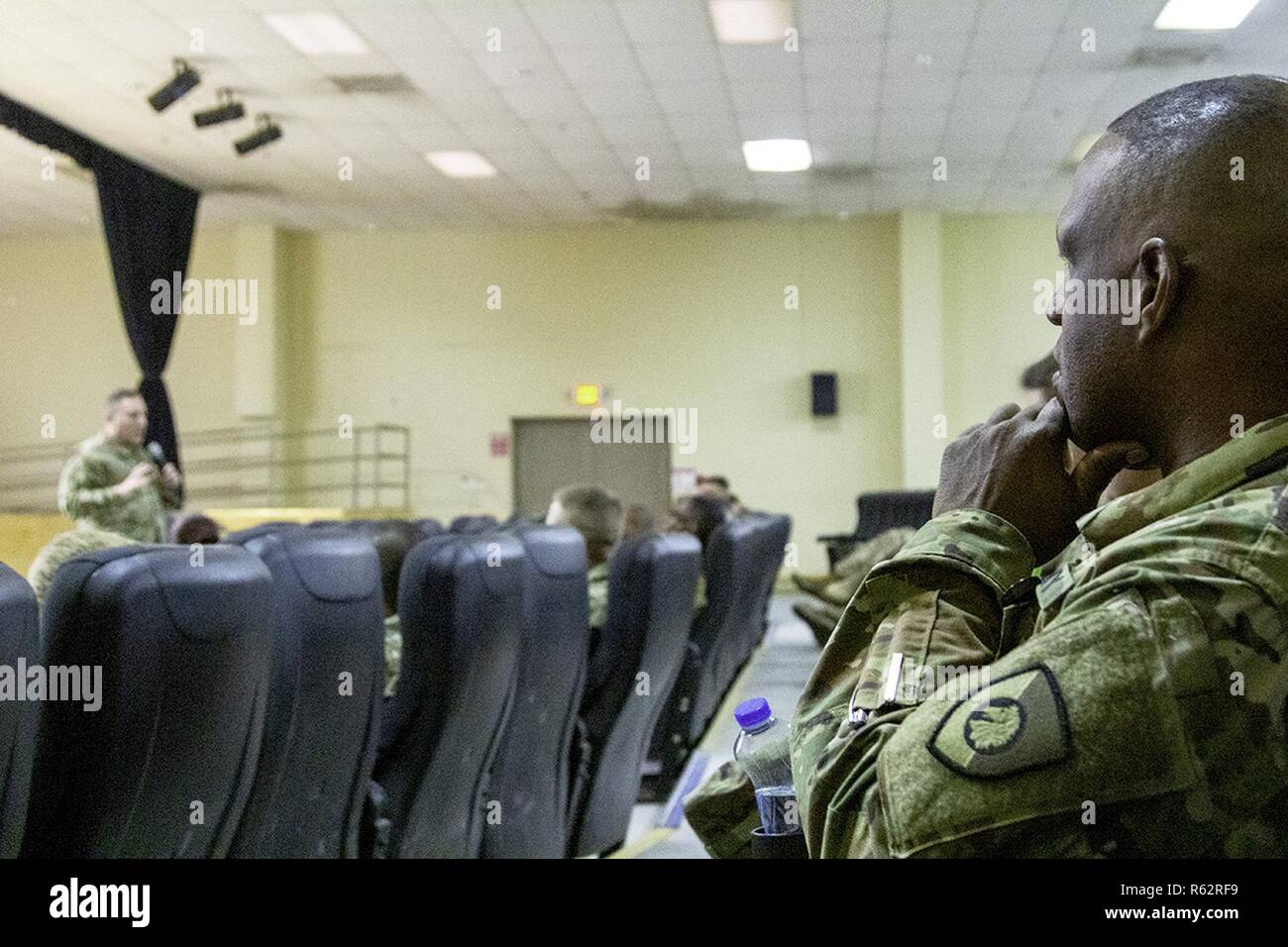 The warrant officers of the 300th Sustainment Brigade listens to ...