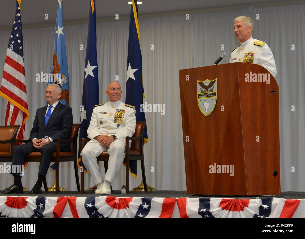 Adm. Craig S. Faller, USN, right, incoming commander of U.S. Southern Command, addresses the ...