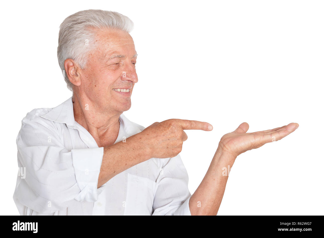 Successful senior man in white shirt posing Stock Photo - Alamy