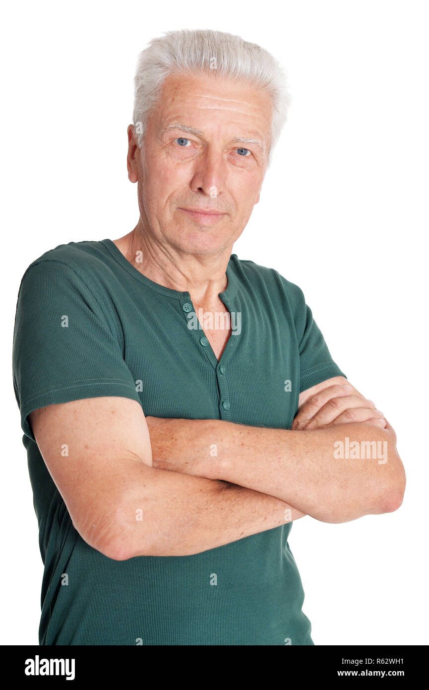 Confident senior man with crossed arms on white background Stock Photo ...