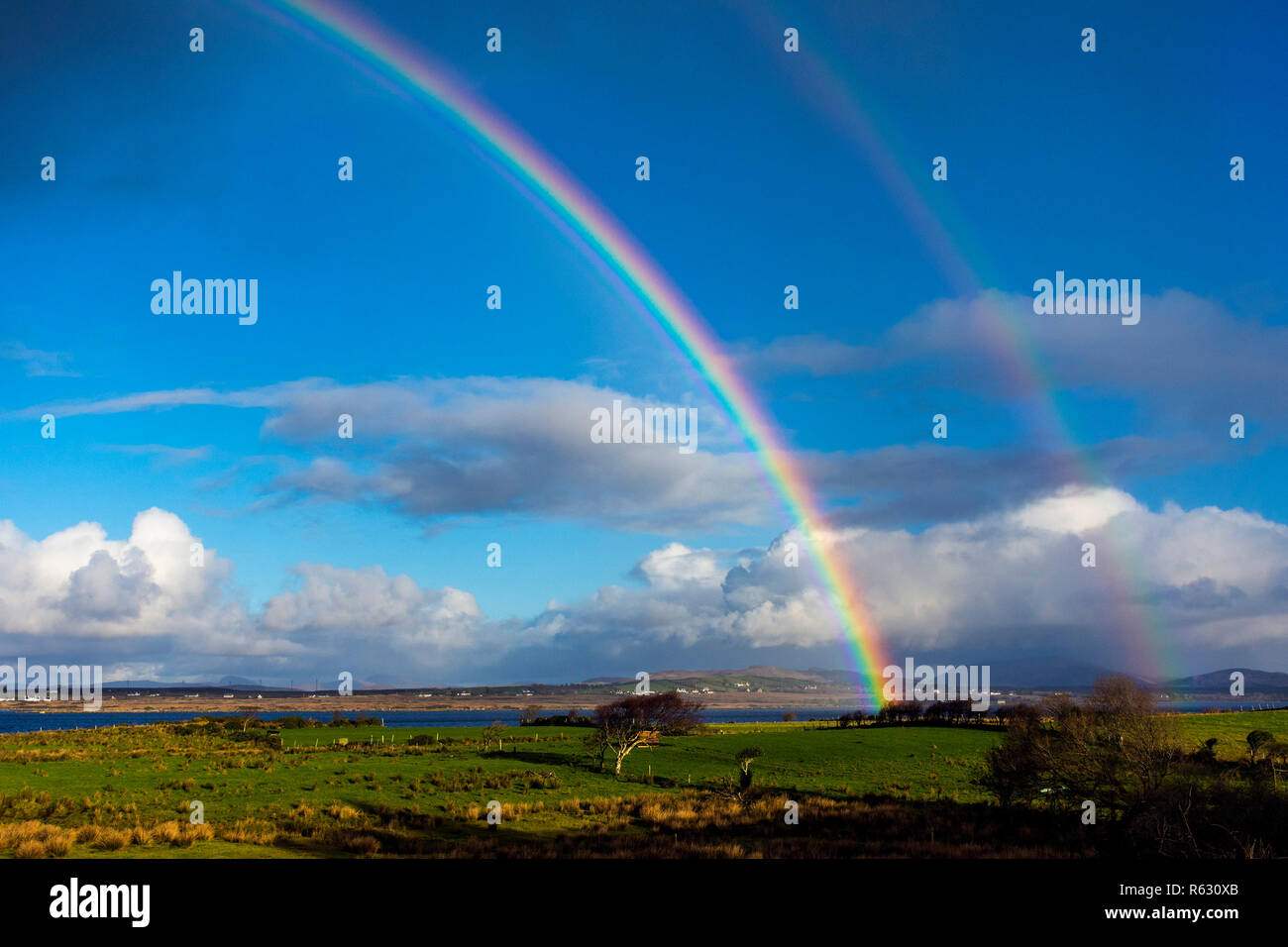 Ardara, County Donegal, Ireland. 3rd December 2018. A rainbow appears ...
