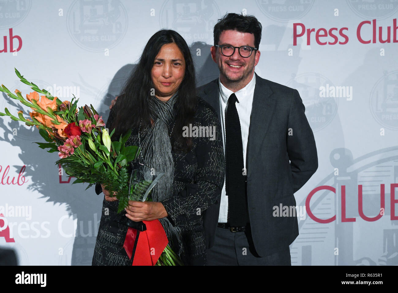 Los Angeles, California, USA. 2nd Dec, 2018. LAURIE OCHOA and PETER ...