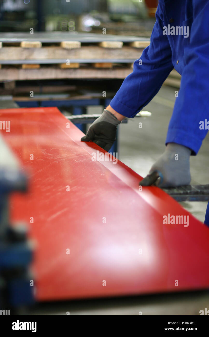 hard working, operator bending metal sheet by sheet bending machine ...