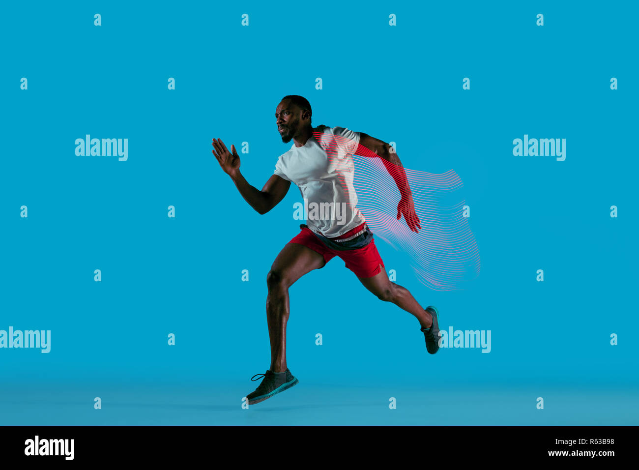 Full length portrait of active young african muscular running man ...