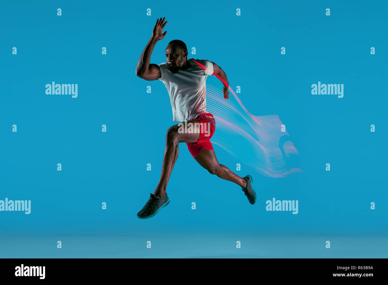 Full length portrait of active young african muscular running man ...