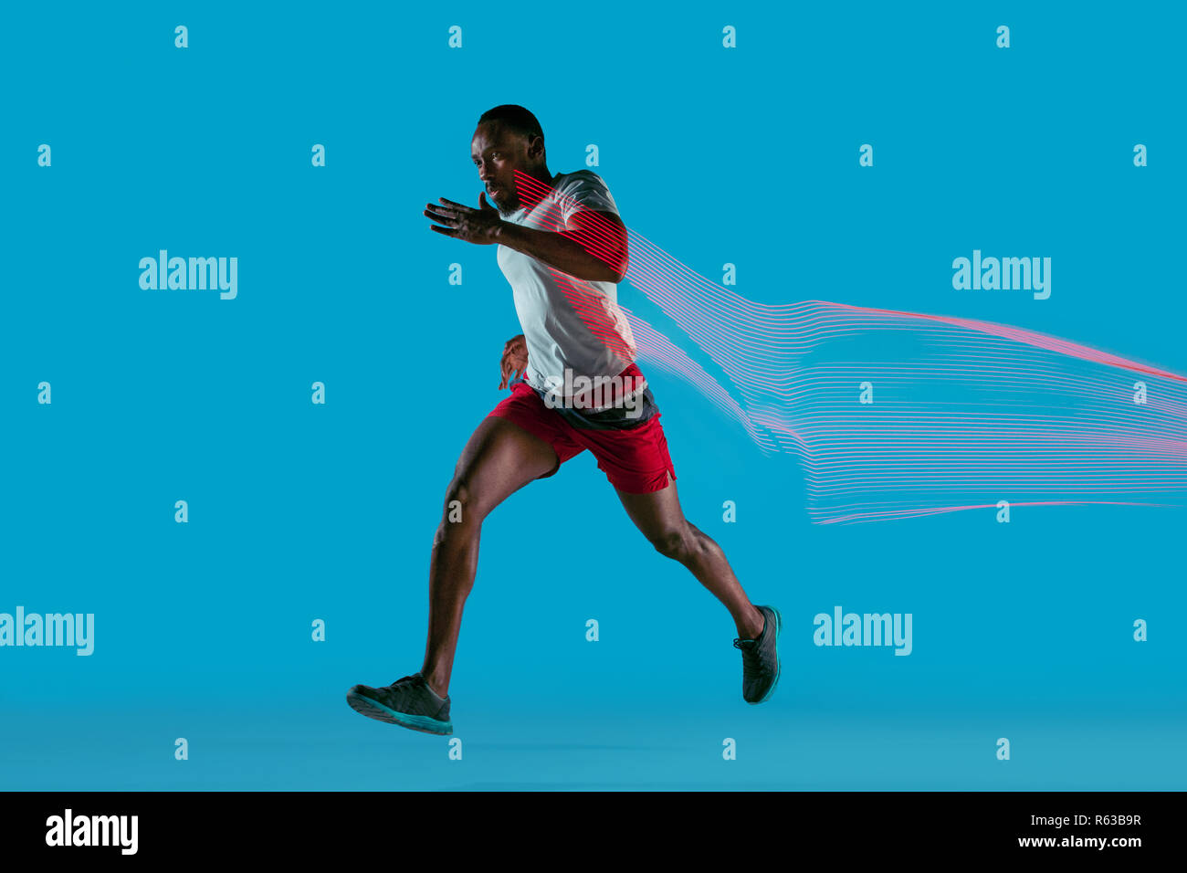 Full length portrait of active young african muscular running man ...