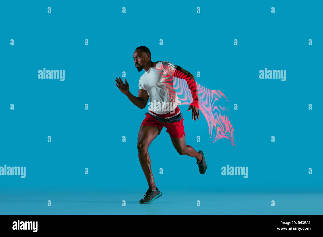 Full length portrait of active young african muscular running man ...