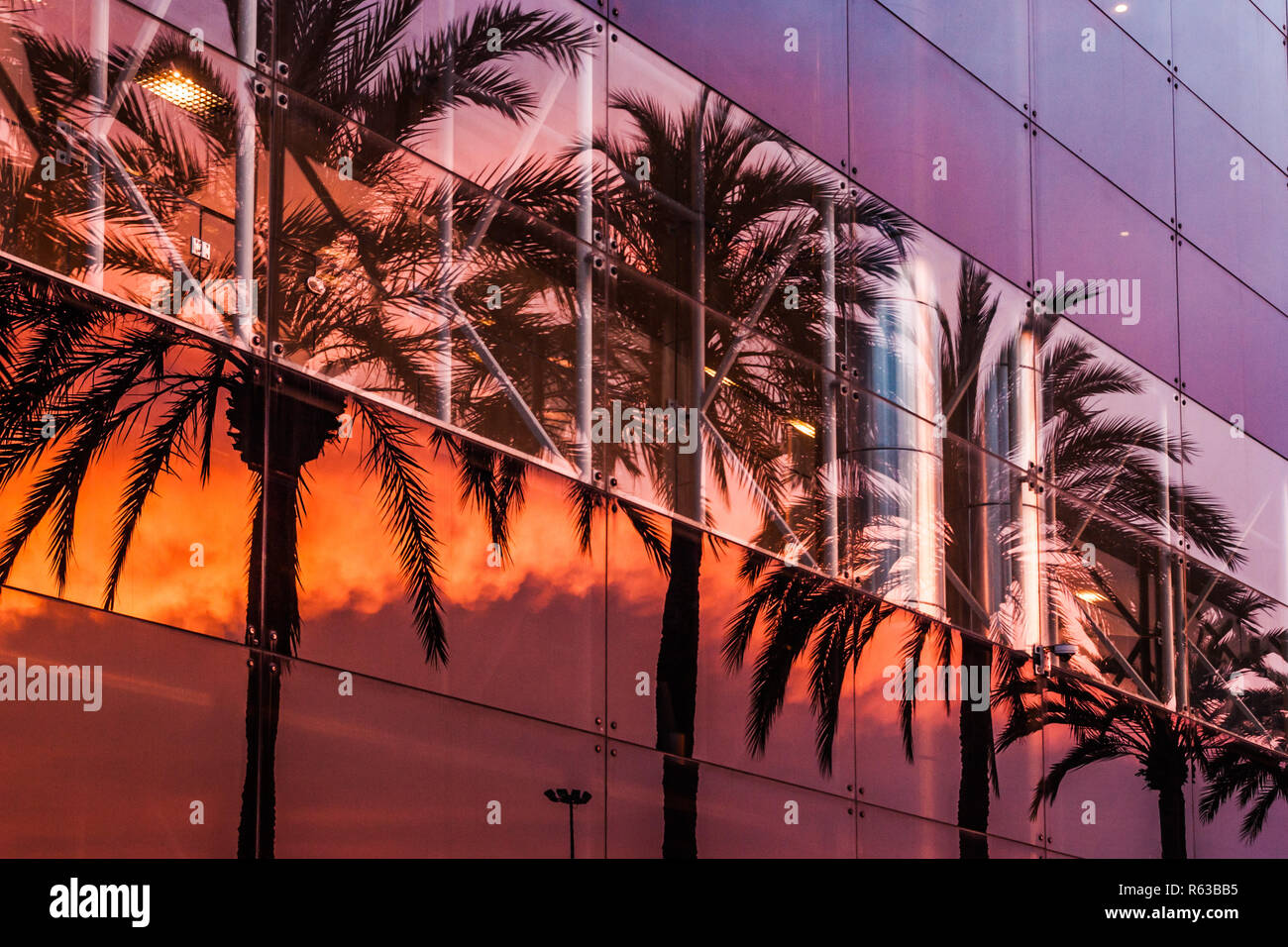 Sunset sky reflected on the window of the bus Stock Photo - Alamy