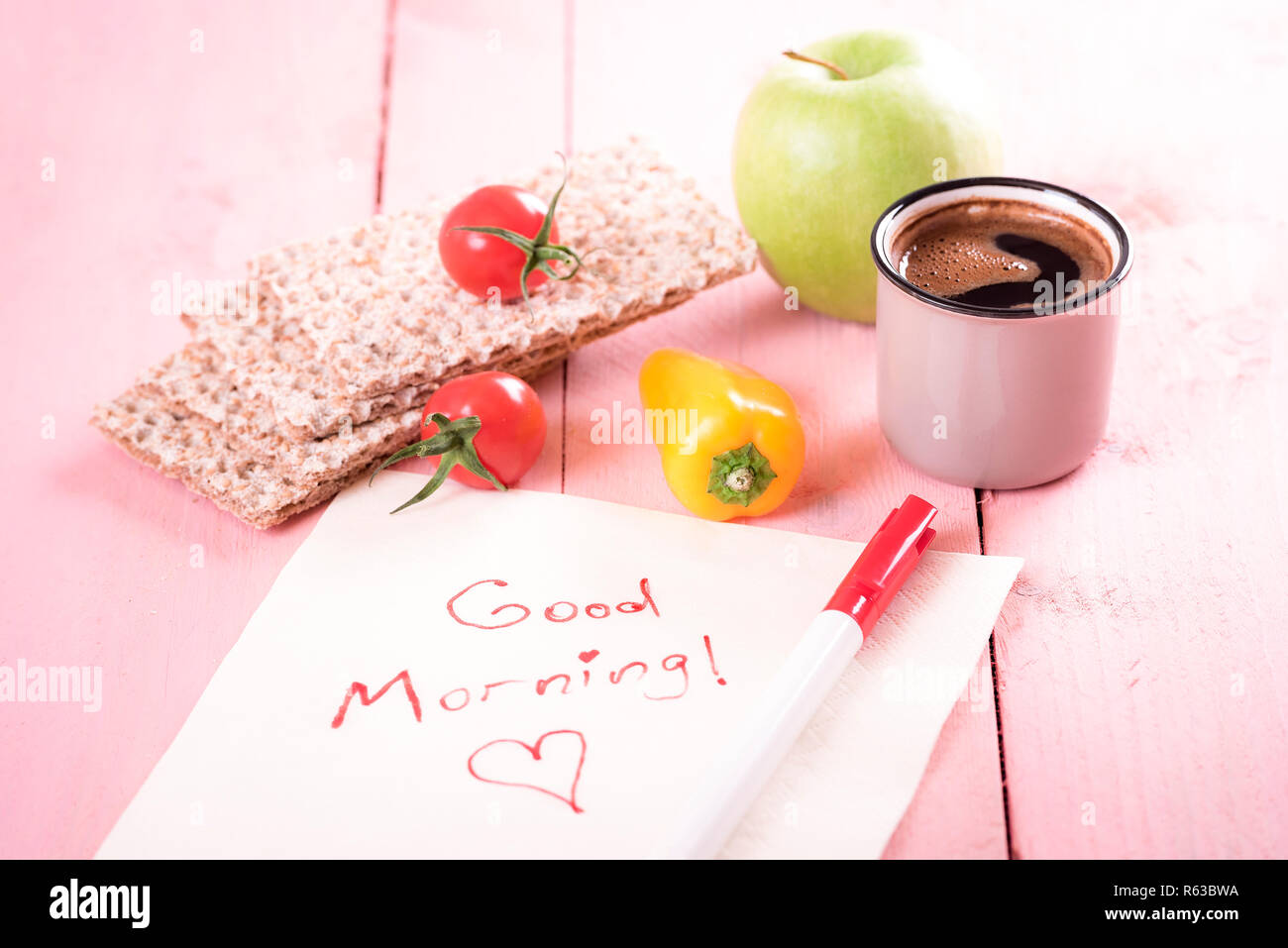 Good morning text on a napkin and snacks Stock Photo - Alamy