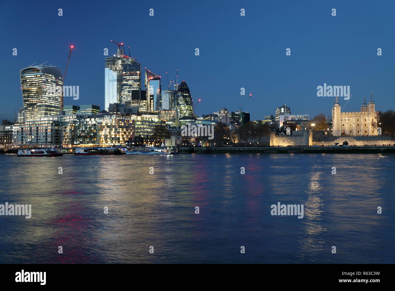 London city's iconic skyline at night, with new skyscrapers which have ...