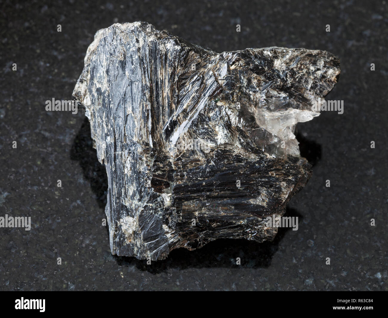 raw Gedrite stone on dark background Stock Photo - Alamy