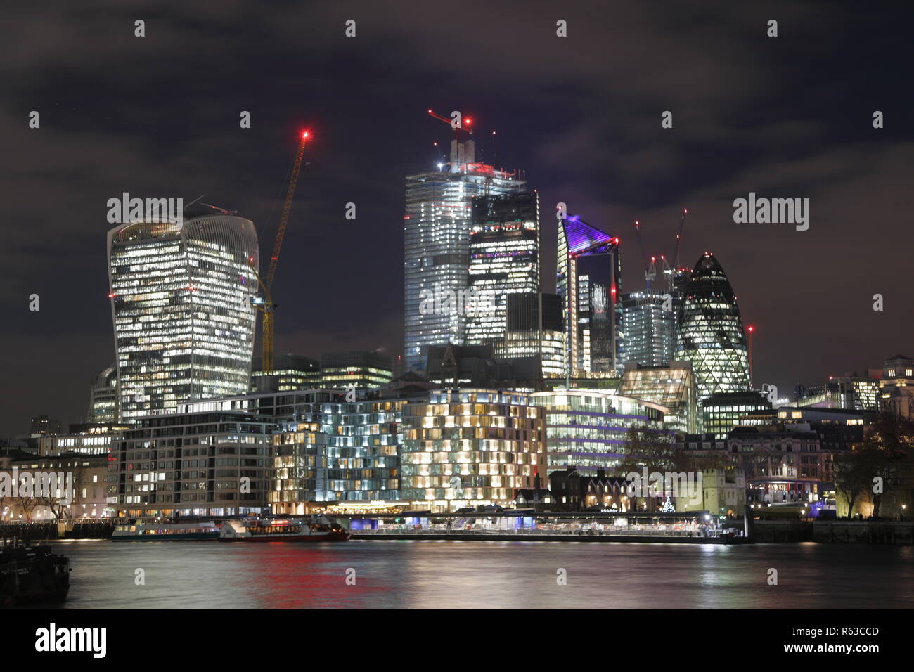 London city's iconic skyline at night, with new skyscrapers which have ...
