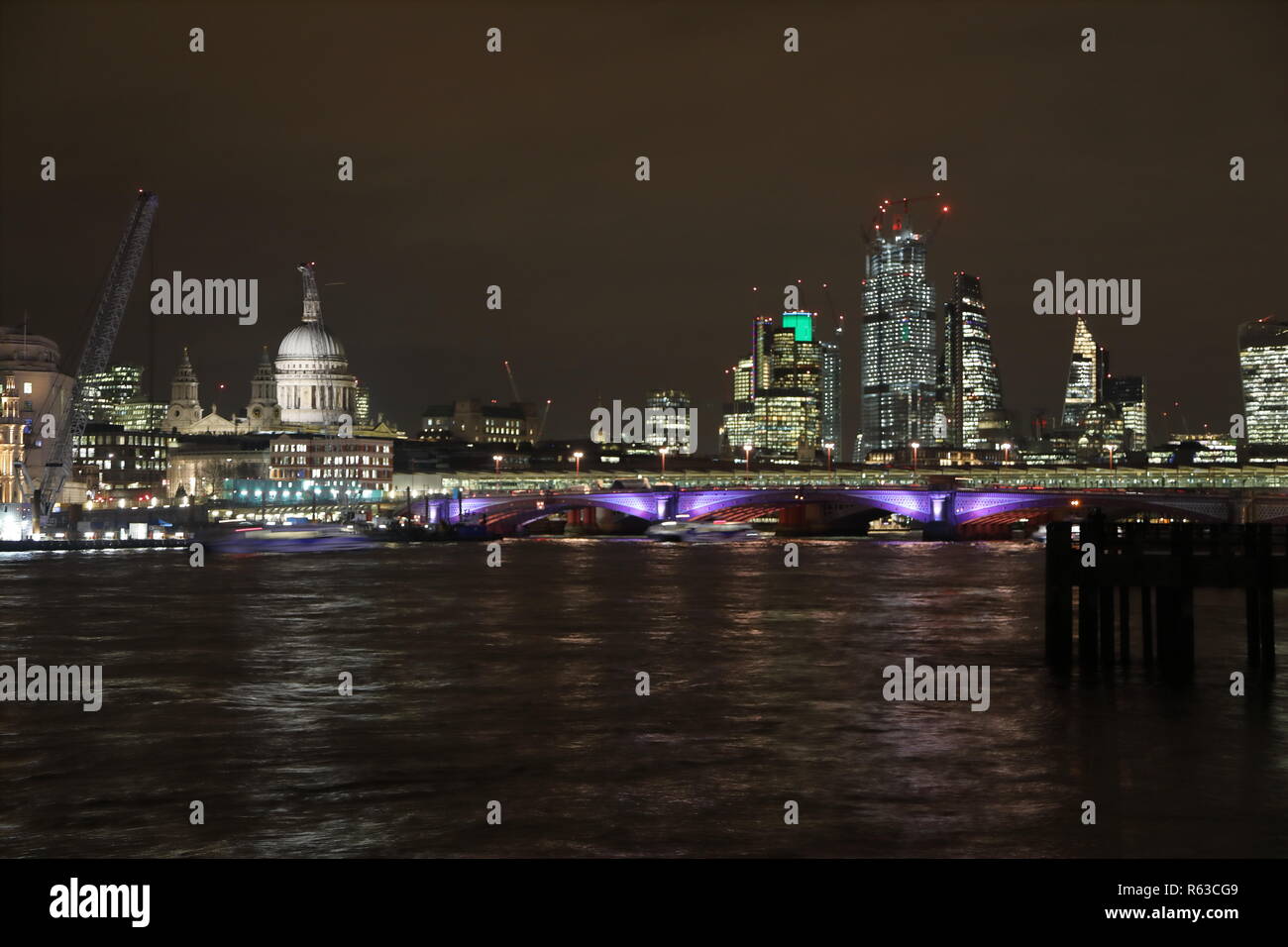 London city's iconic skyline at night, with new skyscrapers which have ...