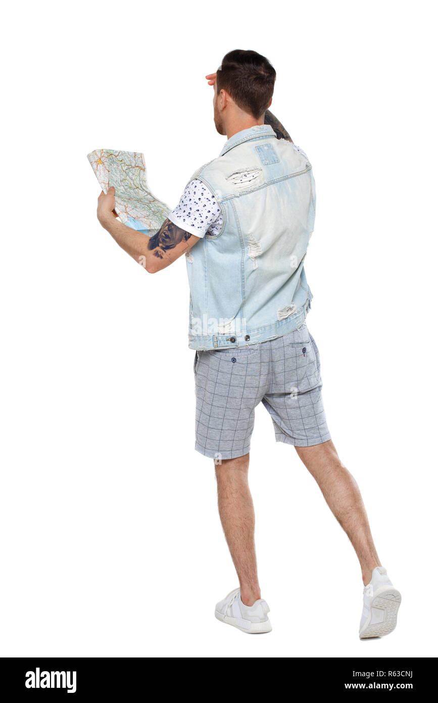 Back view of journey young man looking at the map. Rear view people ...