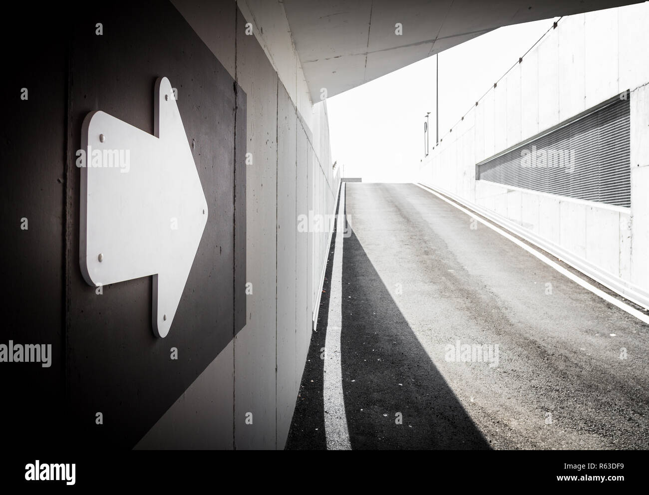 Arrow sign underground road arrow symbol hi-res stock photography and ...