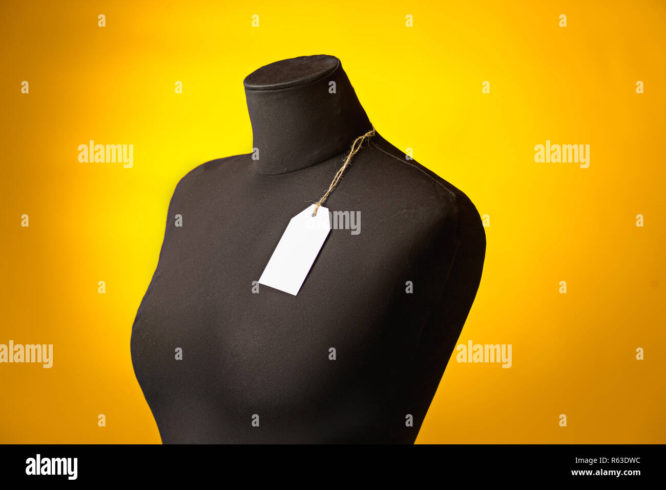 The empty dummy, sale price tag hanging from the button hole Stock ...