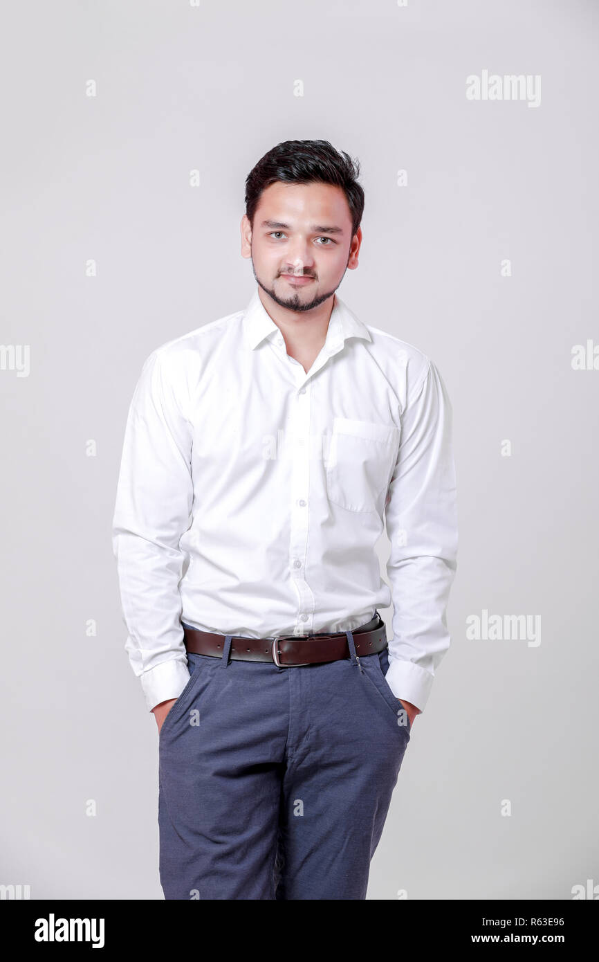 young indian man Standing isolated over white background Stock Photo ...