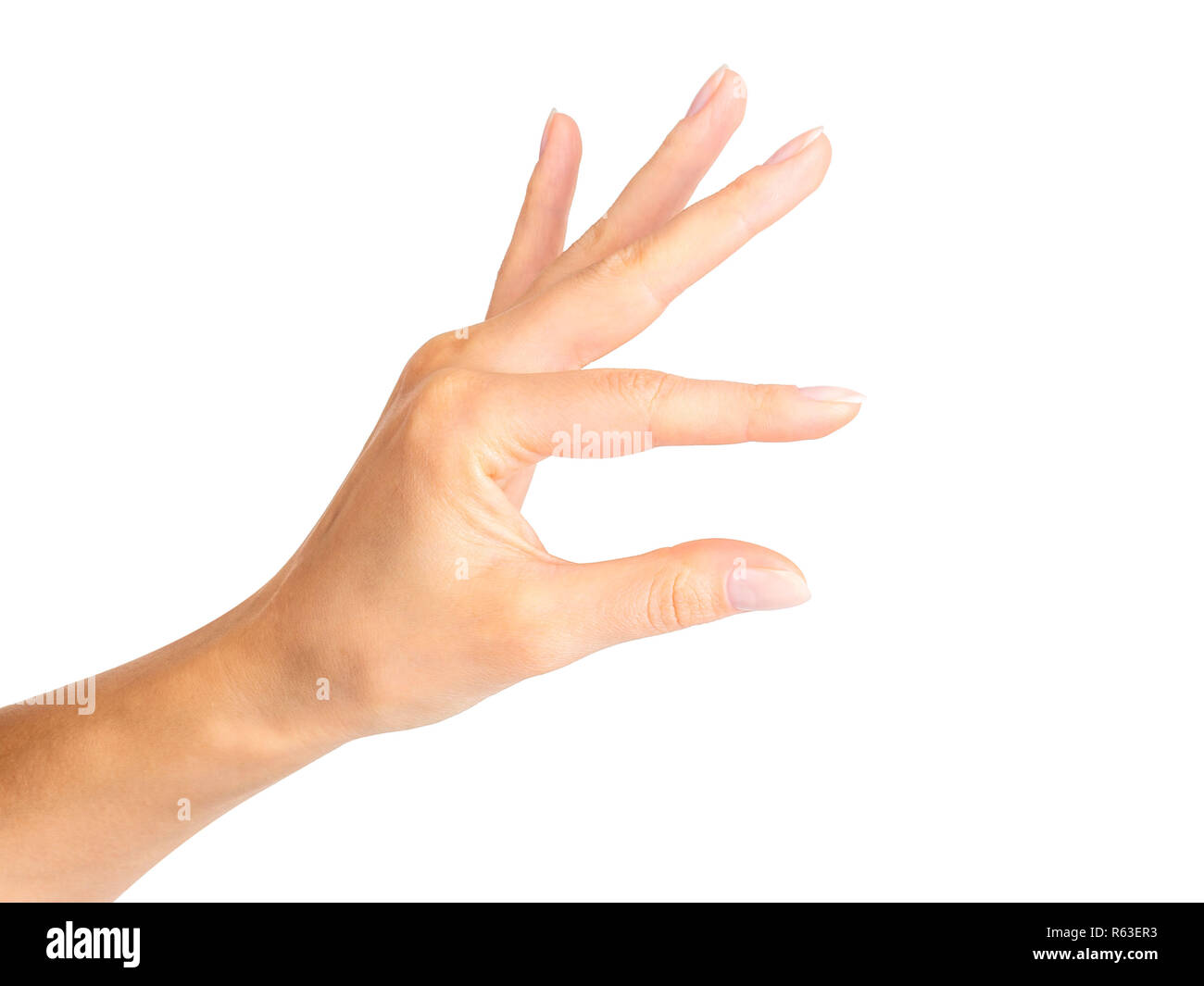 Woman hand holding something little with two fingers Stock Photo - Alamy