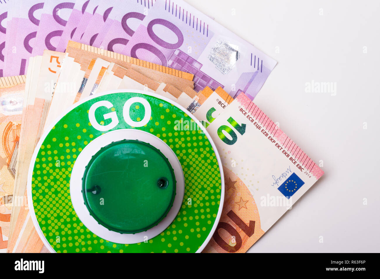 GO green sign with euro money cash background, success concept Stock ...