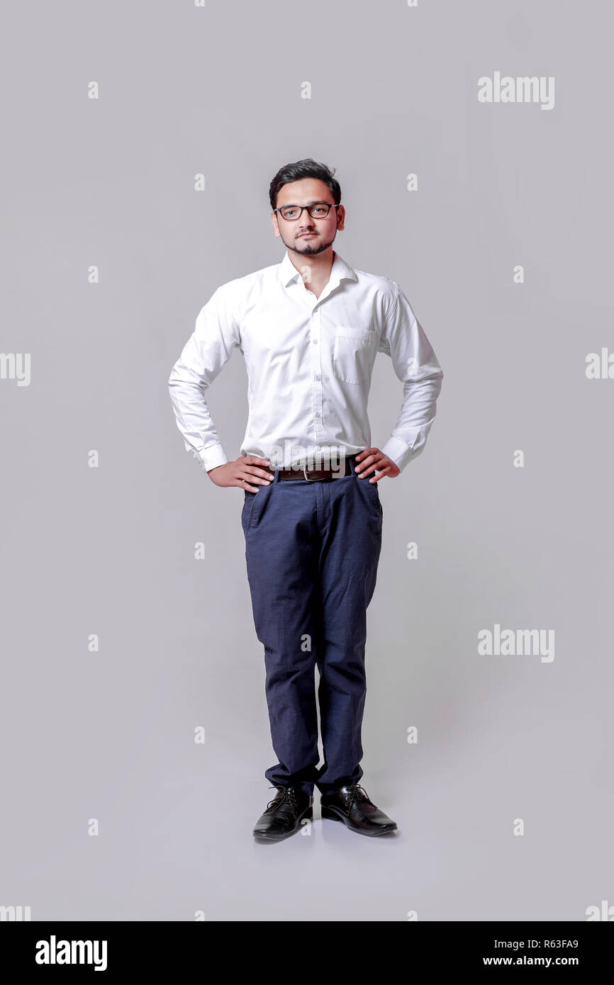 young indian man Standing isolated over white background Stock Photo ...