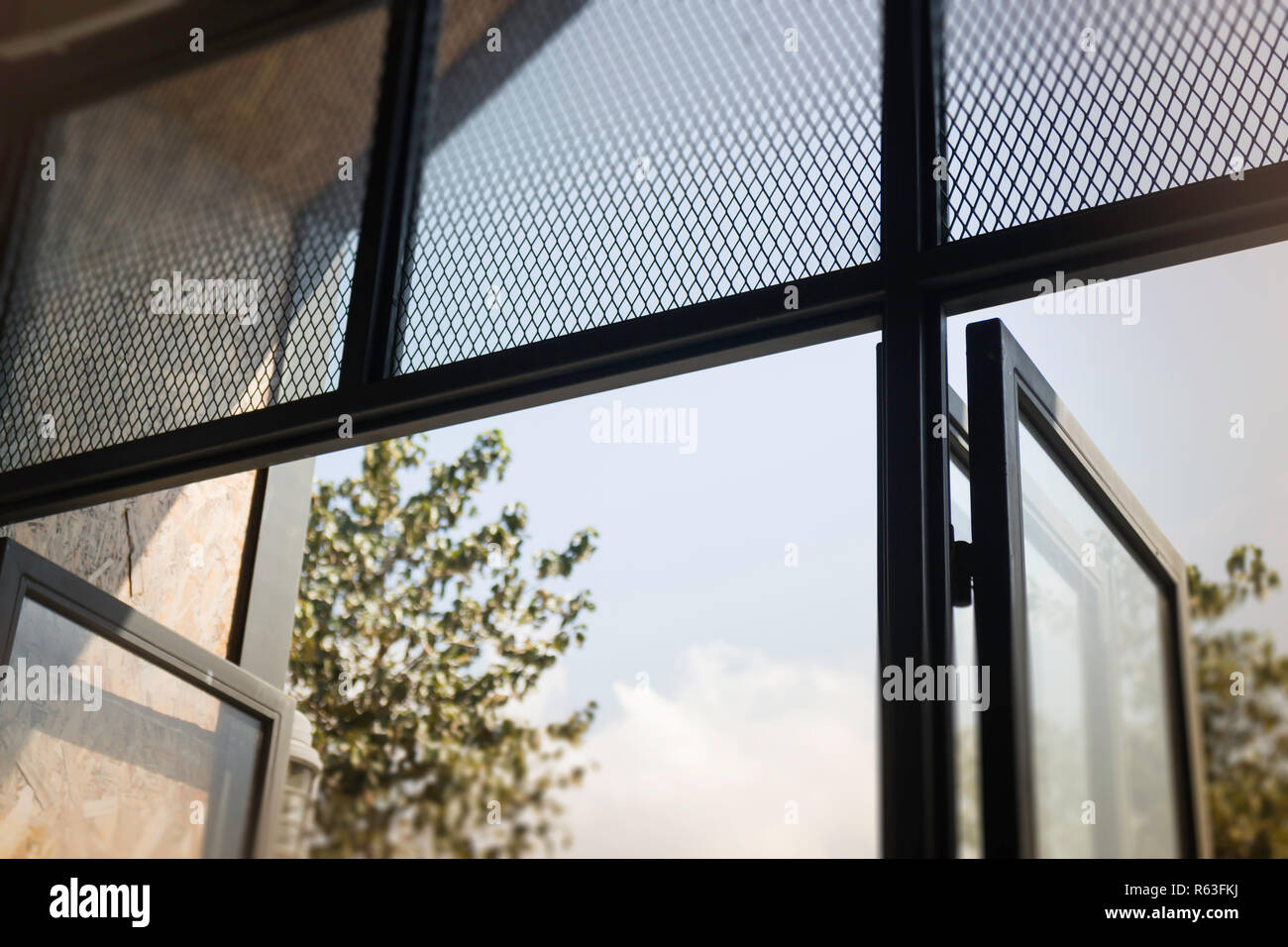 Modern loft window with natural outside view Stock Photo - Alamy