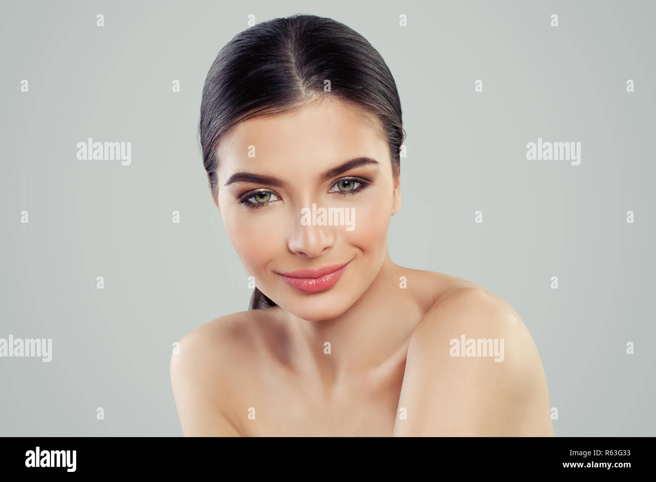 Healthy young woman smiling. Female model with clear skin Stock Photo ...