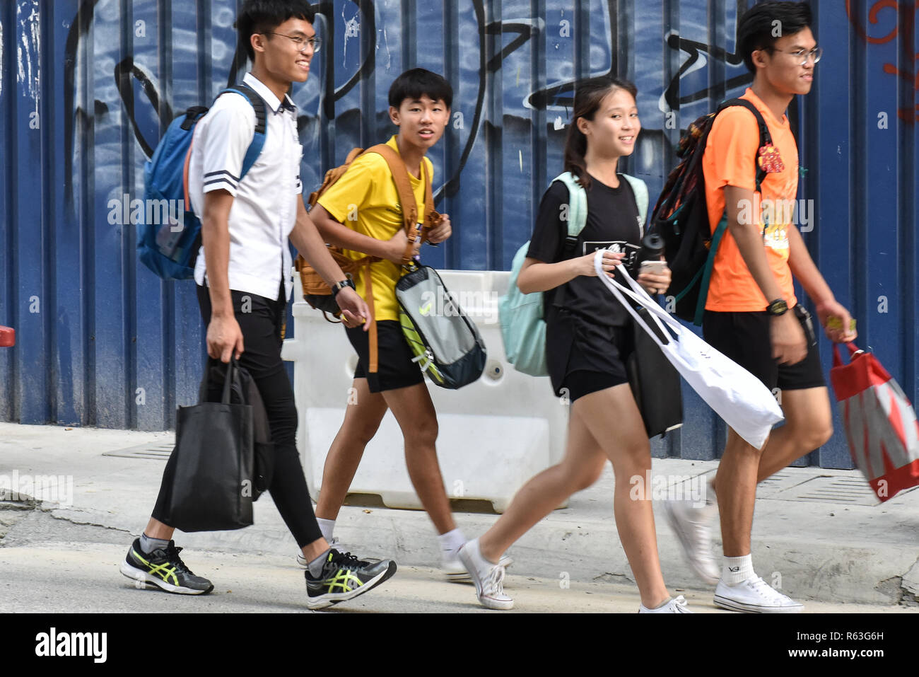 Youth walking, Kuala Lumpur, Malaysia Stock Photo - Alamy