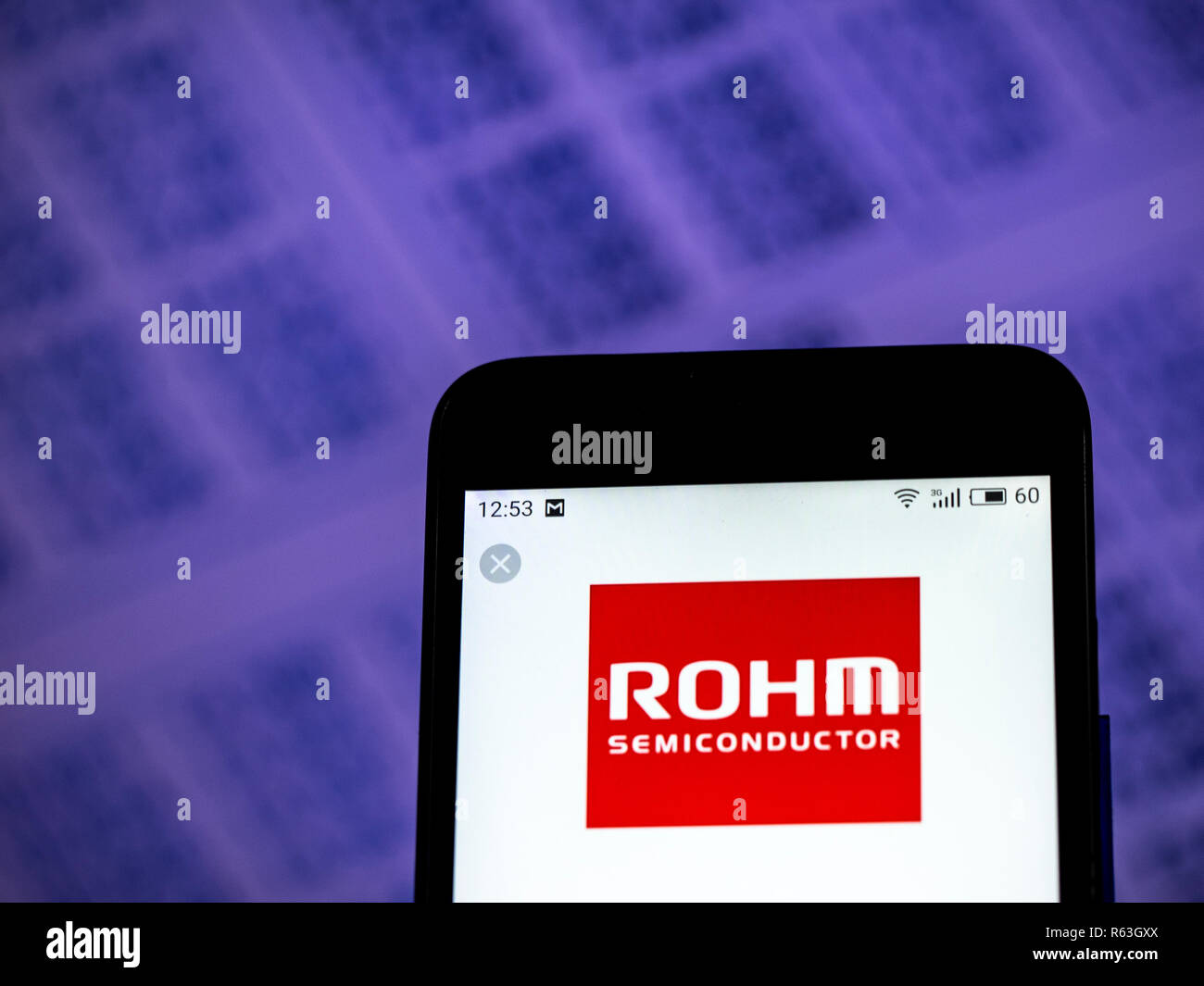 Rohm Electronics industry company logo seen displayed on smart phone ...