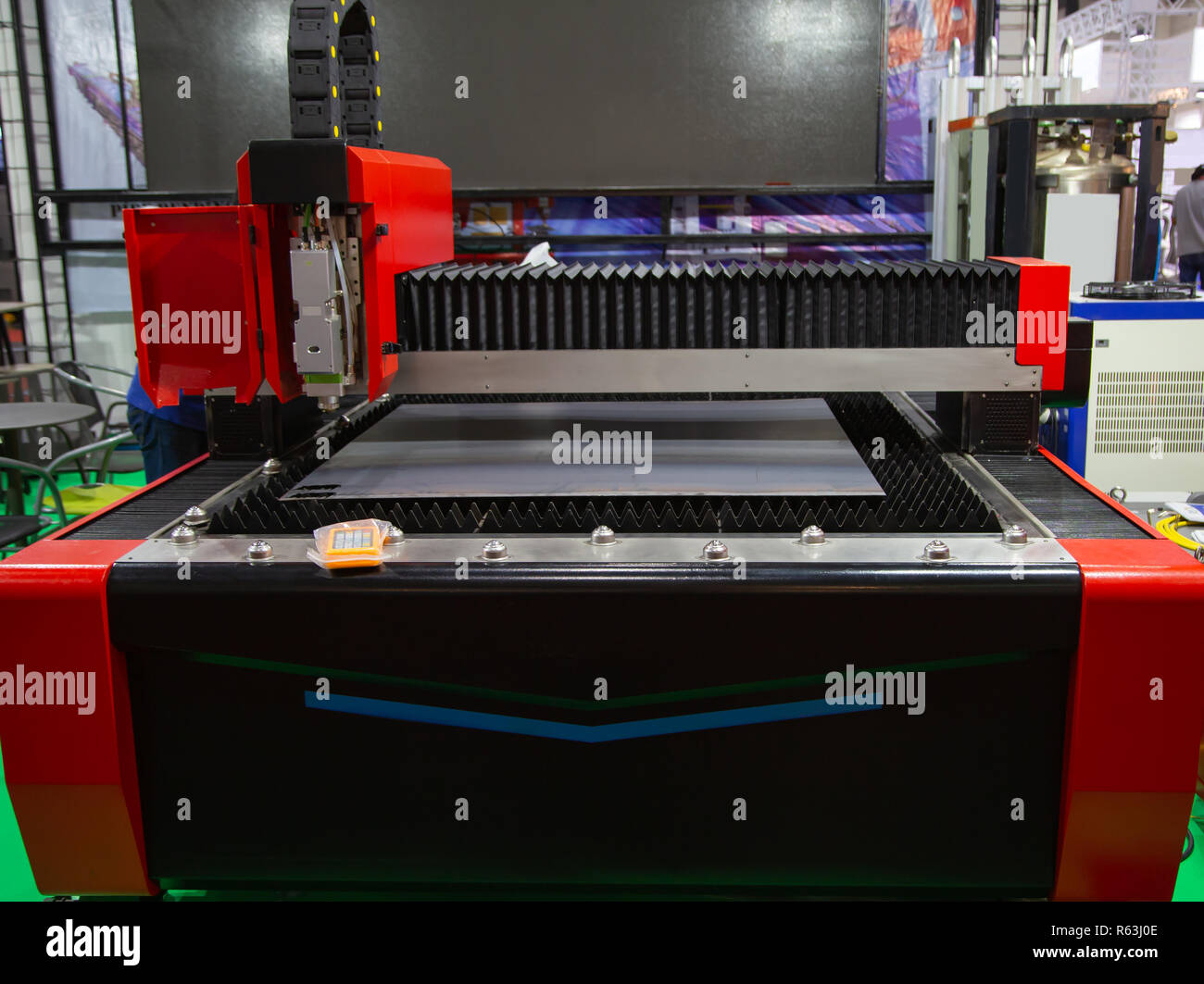 CNC laser cutting machine cutting metal sheet Stock Photo - Alamy