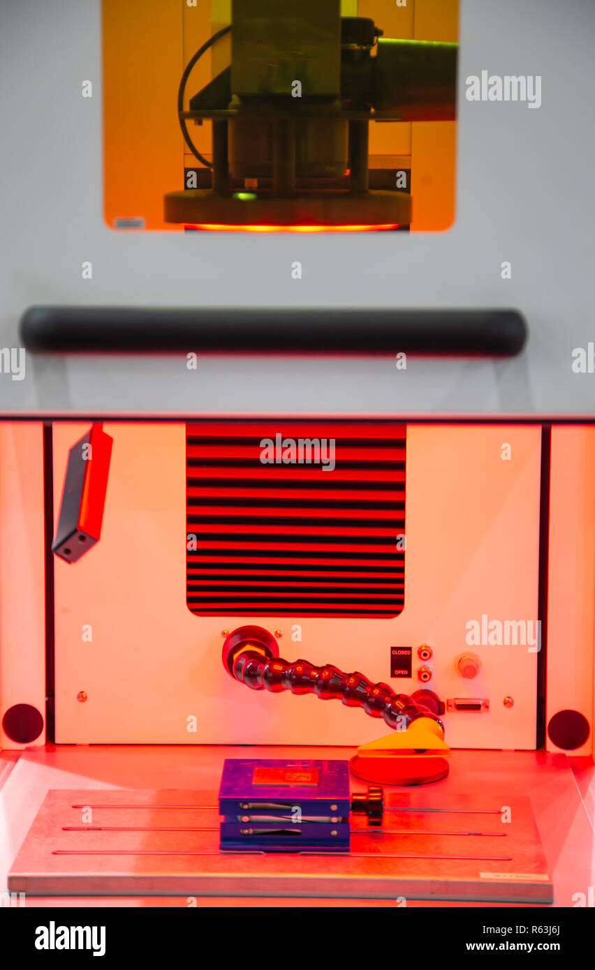 3D laser marking machine engraving on workpiece surface Stock Photo - Alamy