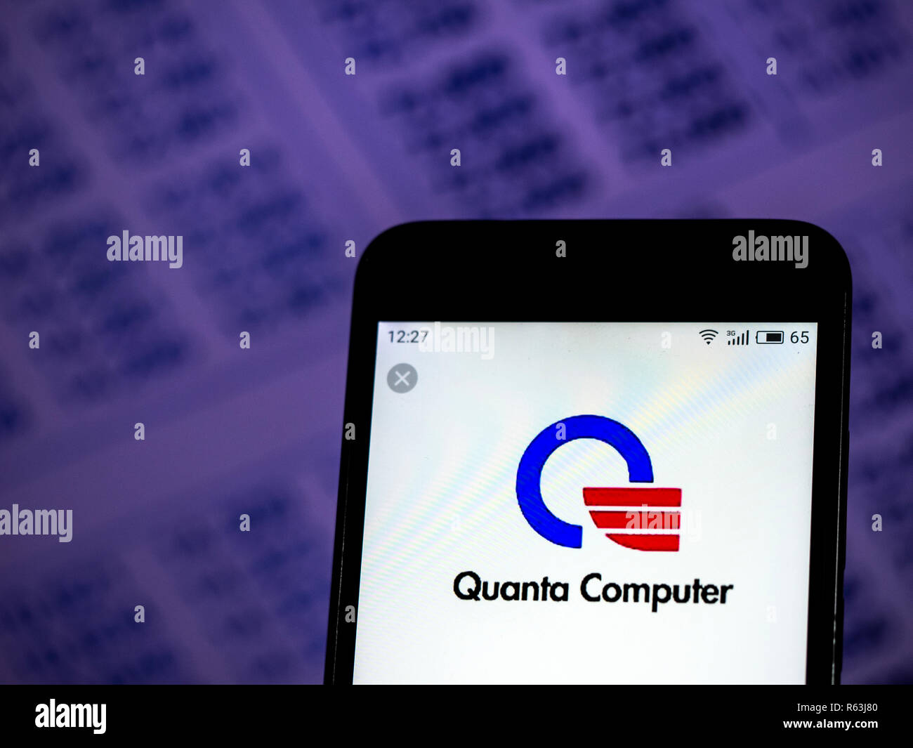 Quanta Computer manufacturing company logo seen displayed on smart ...