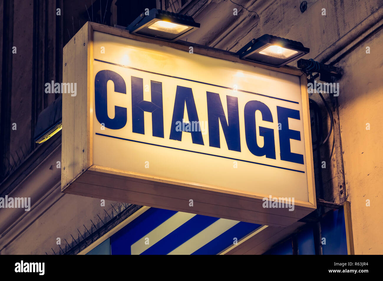 blue change signboard in a street of Paris Stock Photo - Alamy