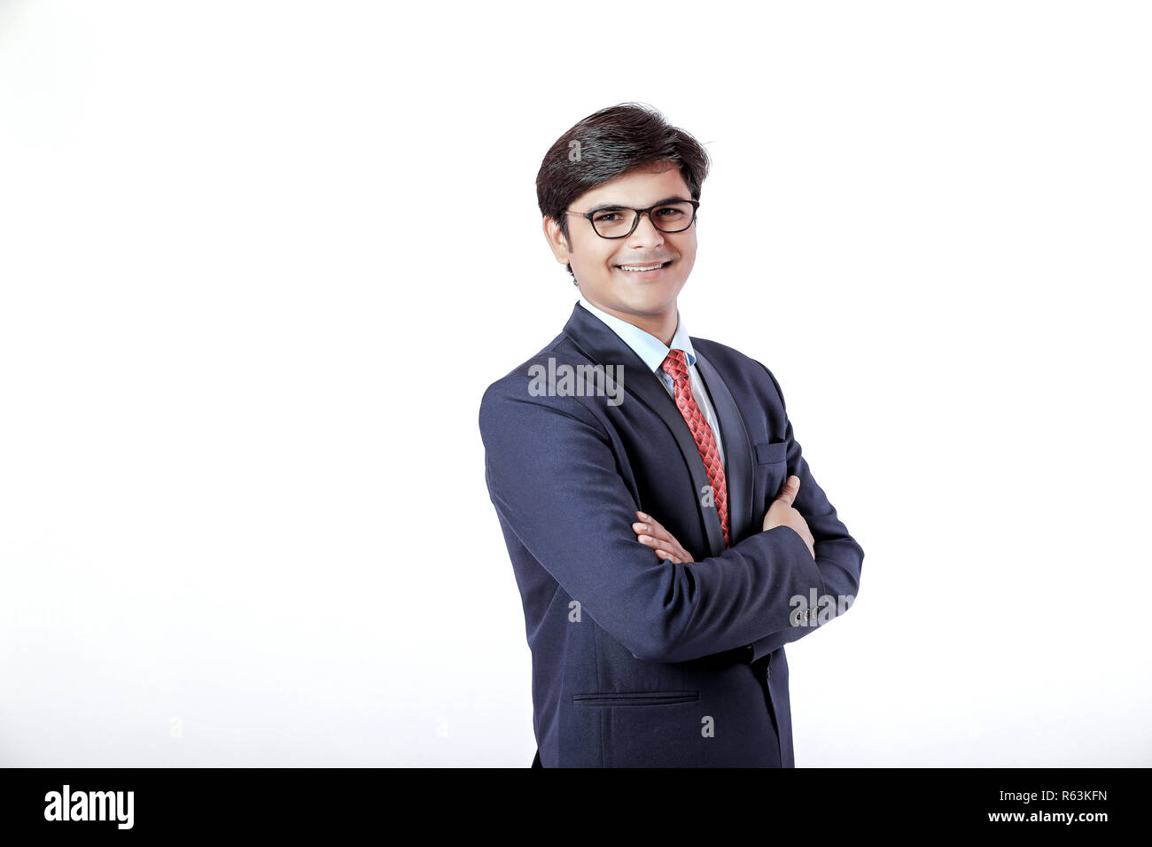 Young Indian businessman over white background Stock Photo - Alamy