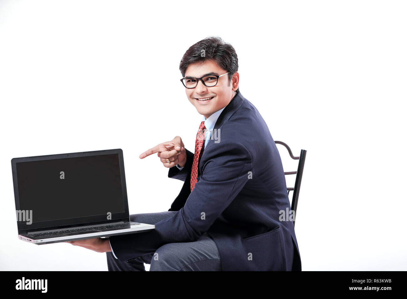 Indian man with laptop hi-res stock photography and images - Alamy
