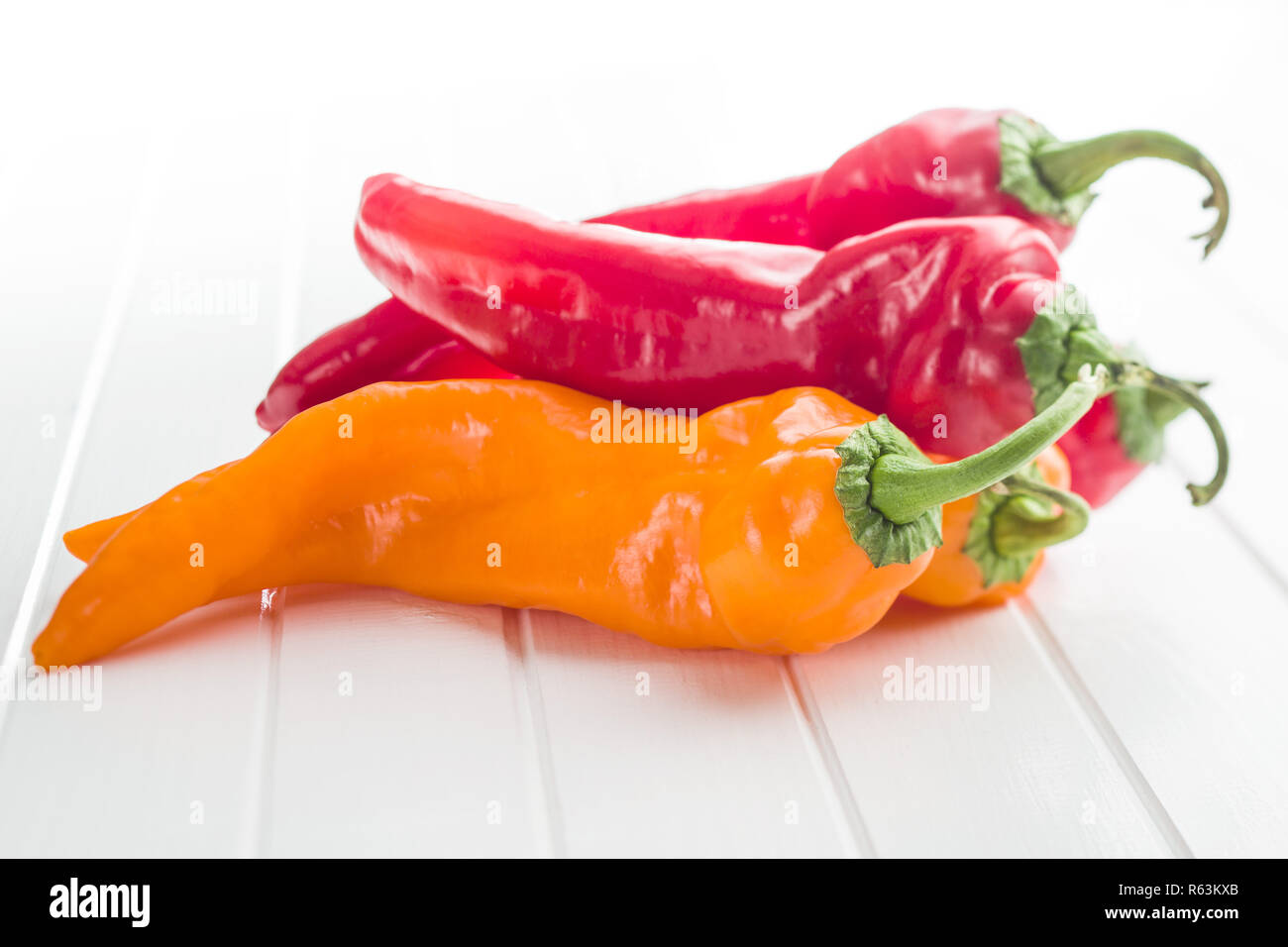 Orange and red peppers Stock Photo - Alamy