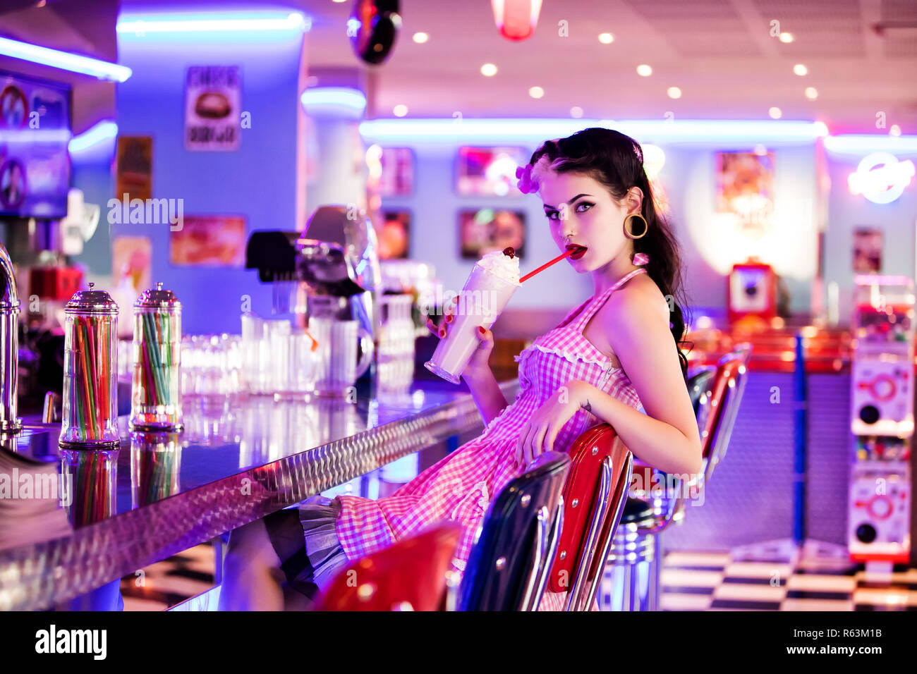 Vintage woman drinking milkshake hi-res stock photography and images ...