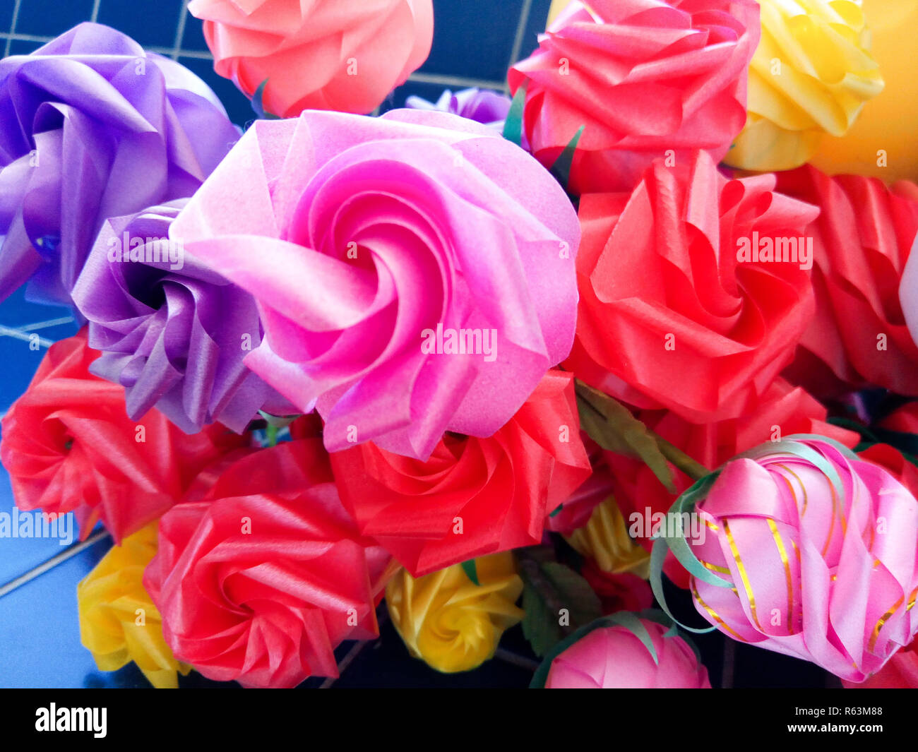 Colorful Fake Rose Flowers Stock Photo - Alamy