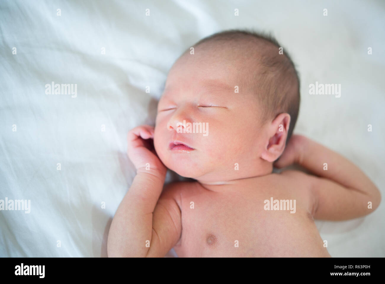 One week old baby human hi-res stock photography and images - Alamy