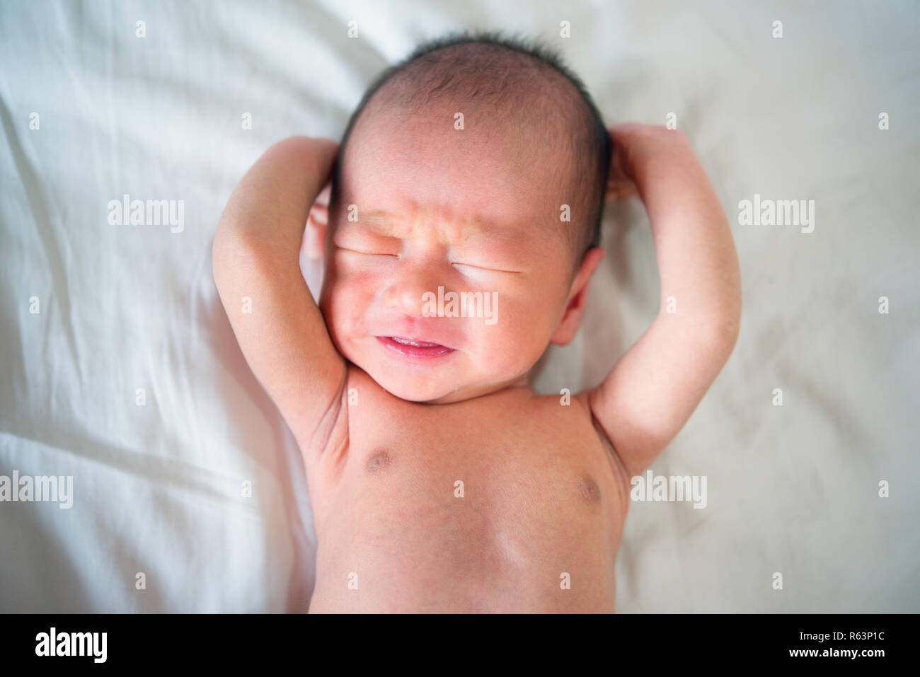 New born baby crying Stock Photo - Alamy