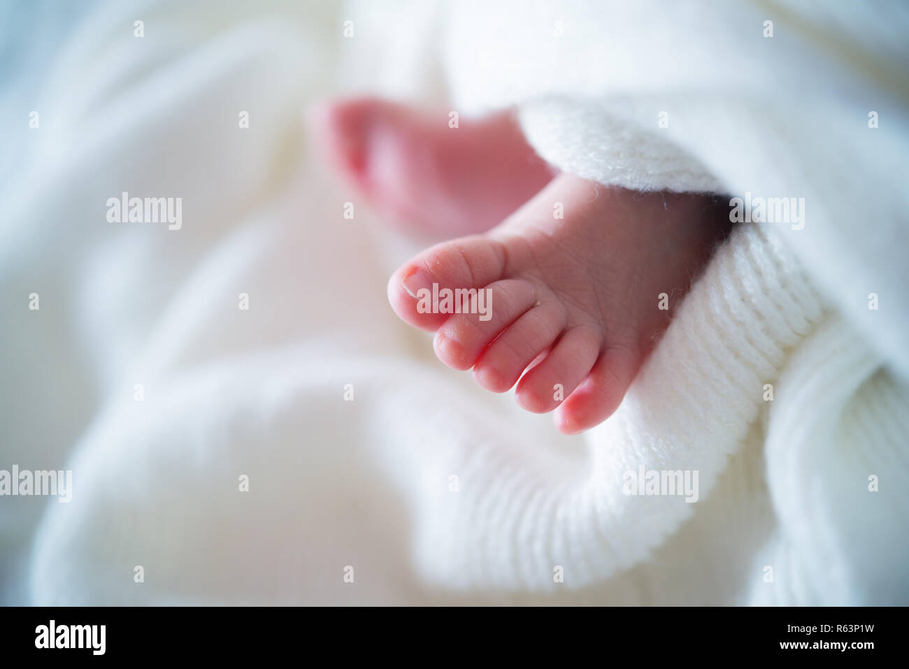 Close up baby feet Stock Photo - Alamy
