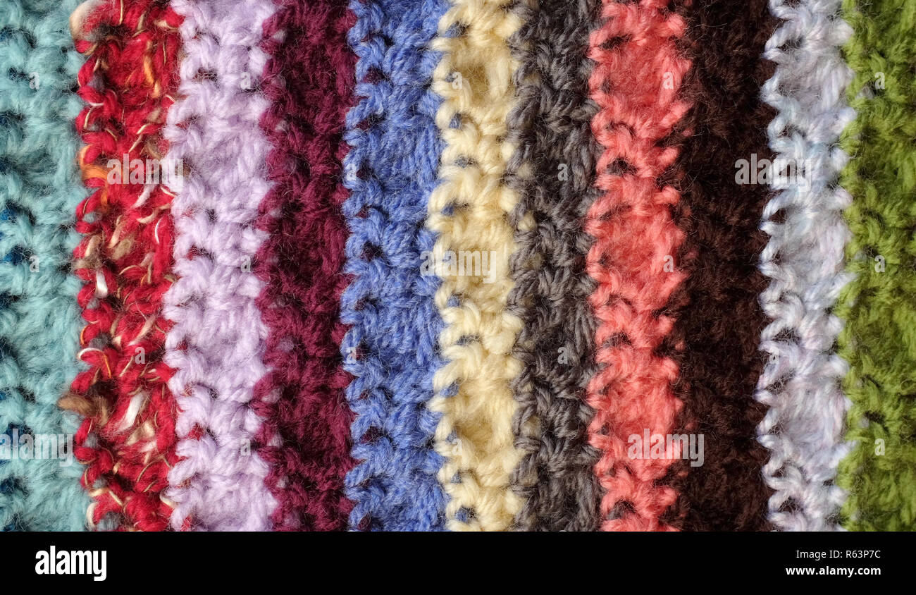 Crocheted yarn stitches in mixed colour stripes background Stock Photo ...